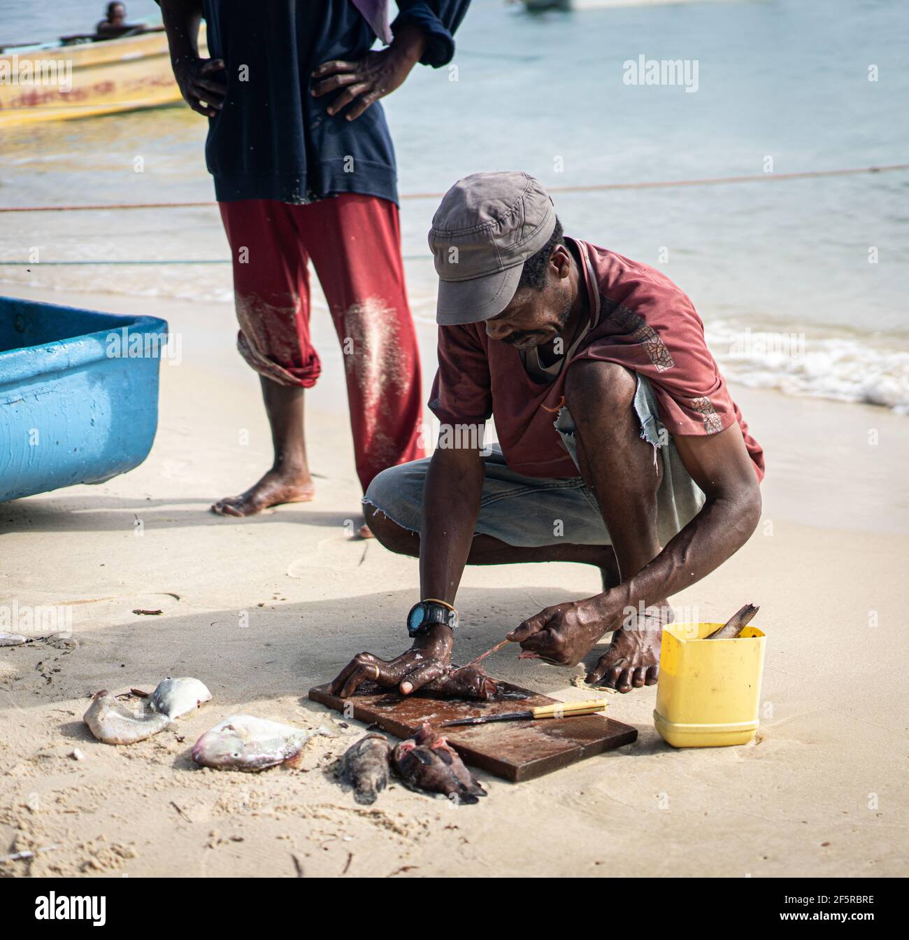 Man cooking fish on boat hi-res stock photography and images - Alamy