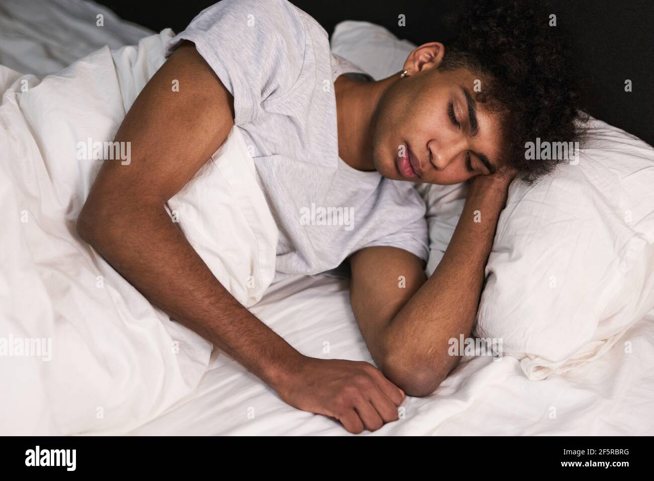 Guy sleeping hi-res stock photography and images - Alamy