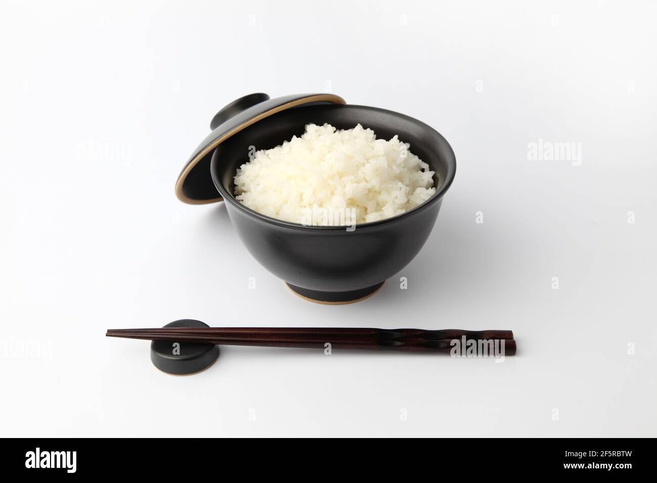 Bowl Of White Rice With Chopsticks