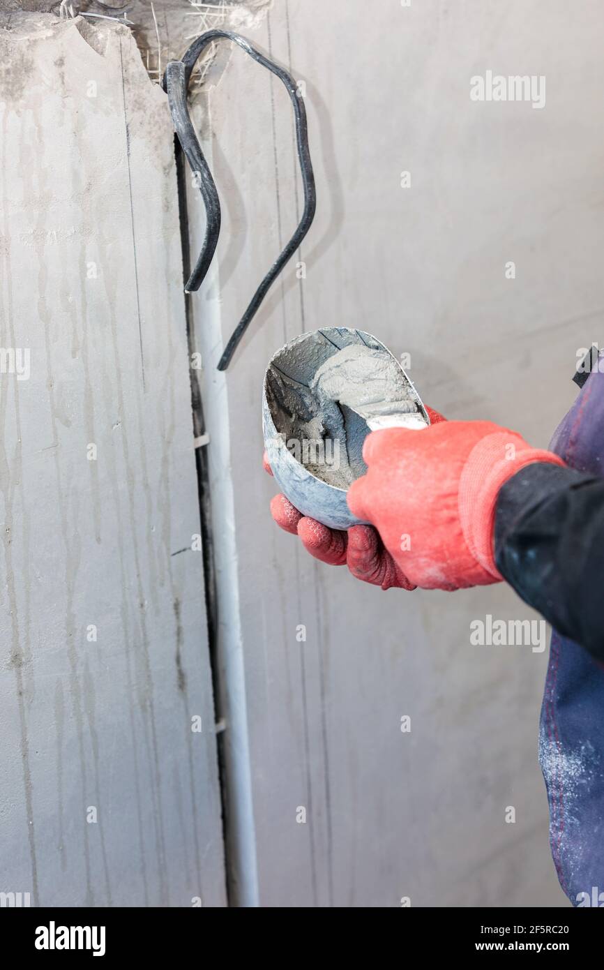 The electrician will plaster holes and channels for sockets and wires ...