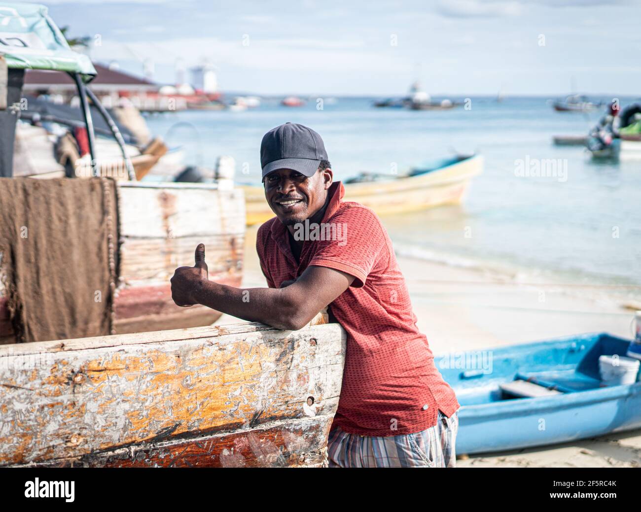Man cooking fish on boat hi-res stock photography and images - Alamy