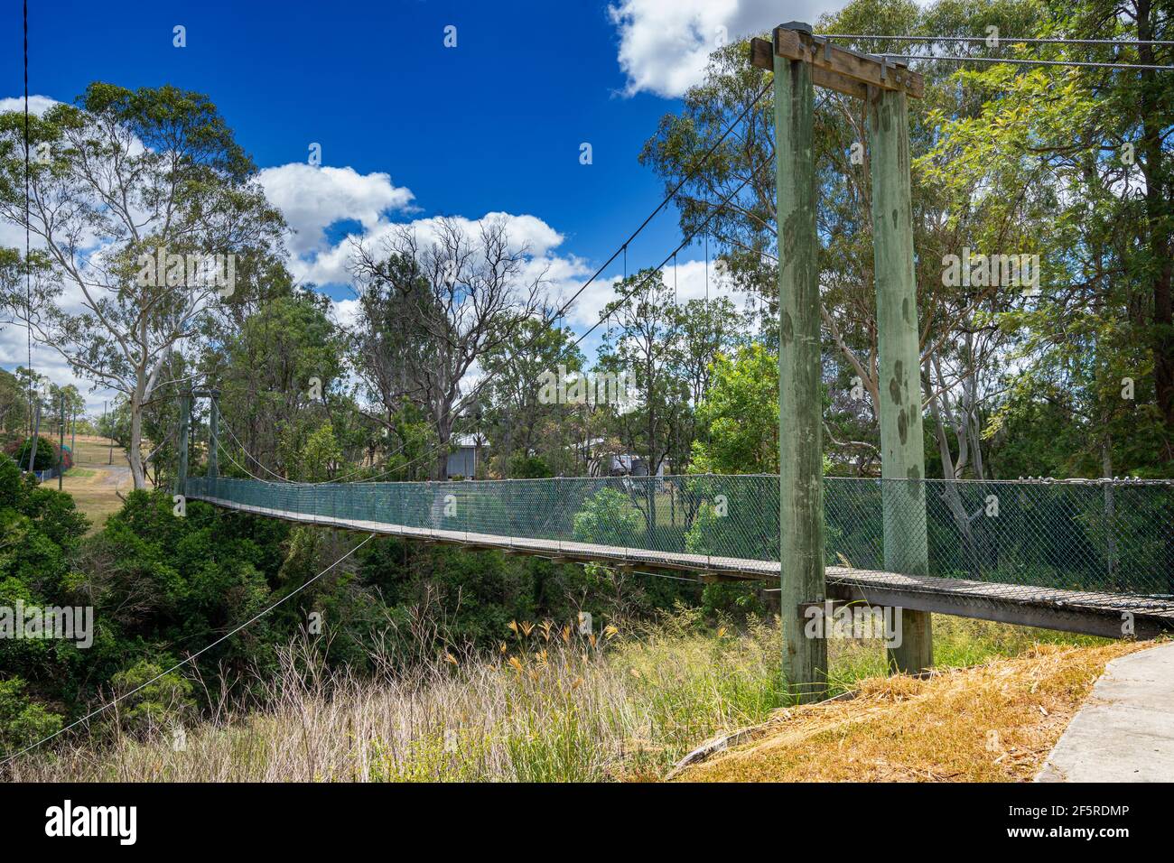 Swinging bridge across Cooyar Creek at Cooyar Swinging Bridge Park ...