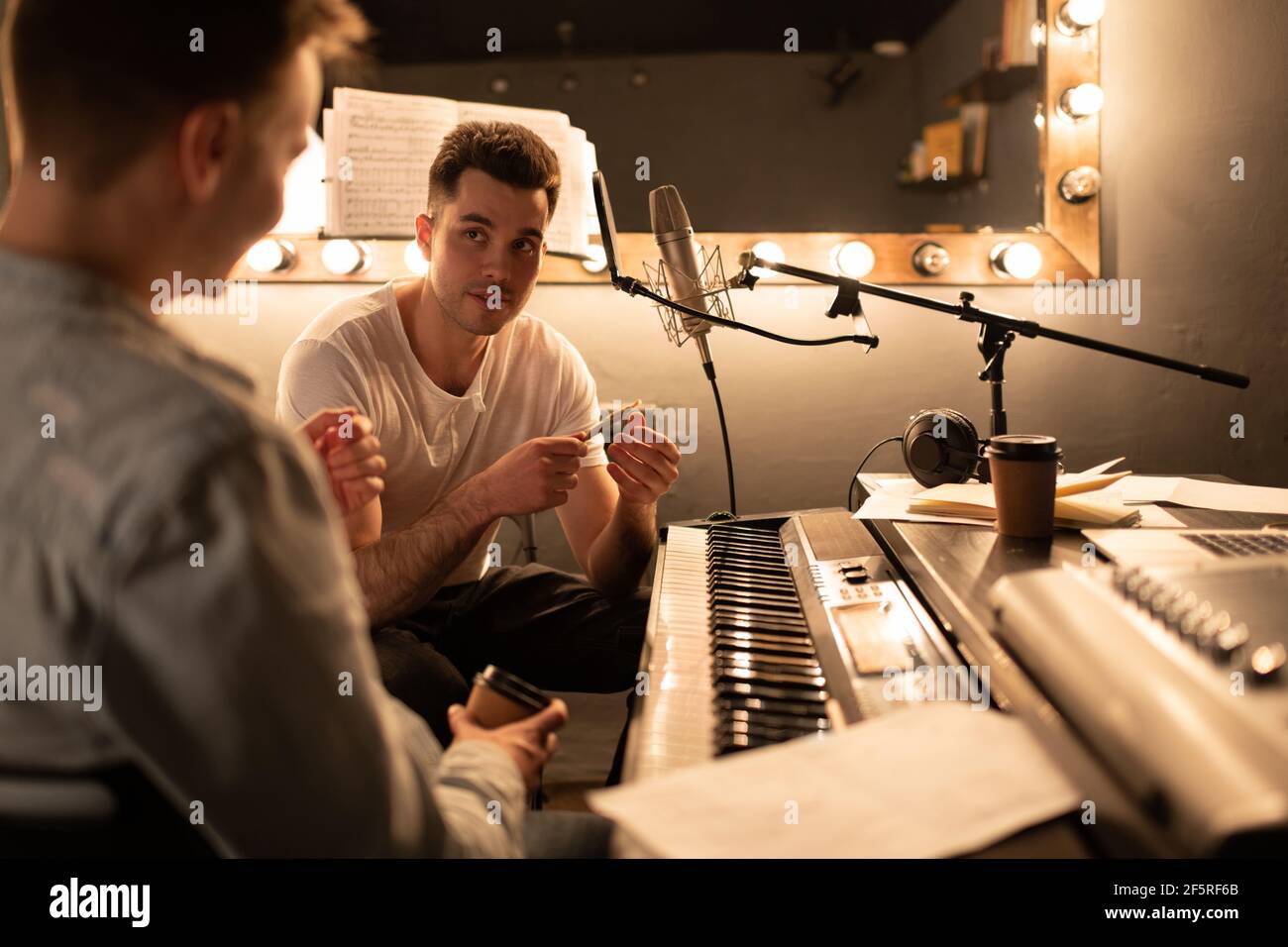 Musicians during pause hi-res stock photography and images - Alamy