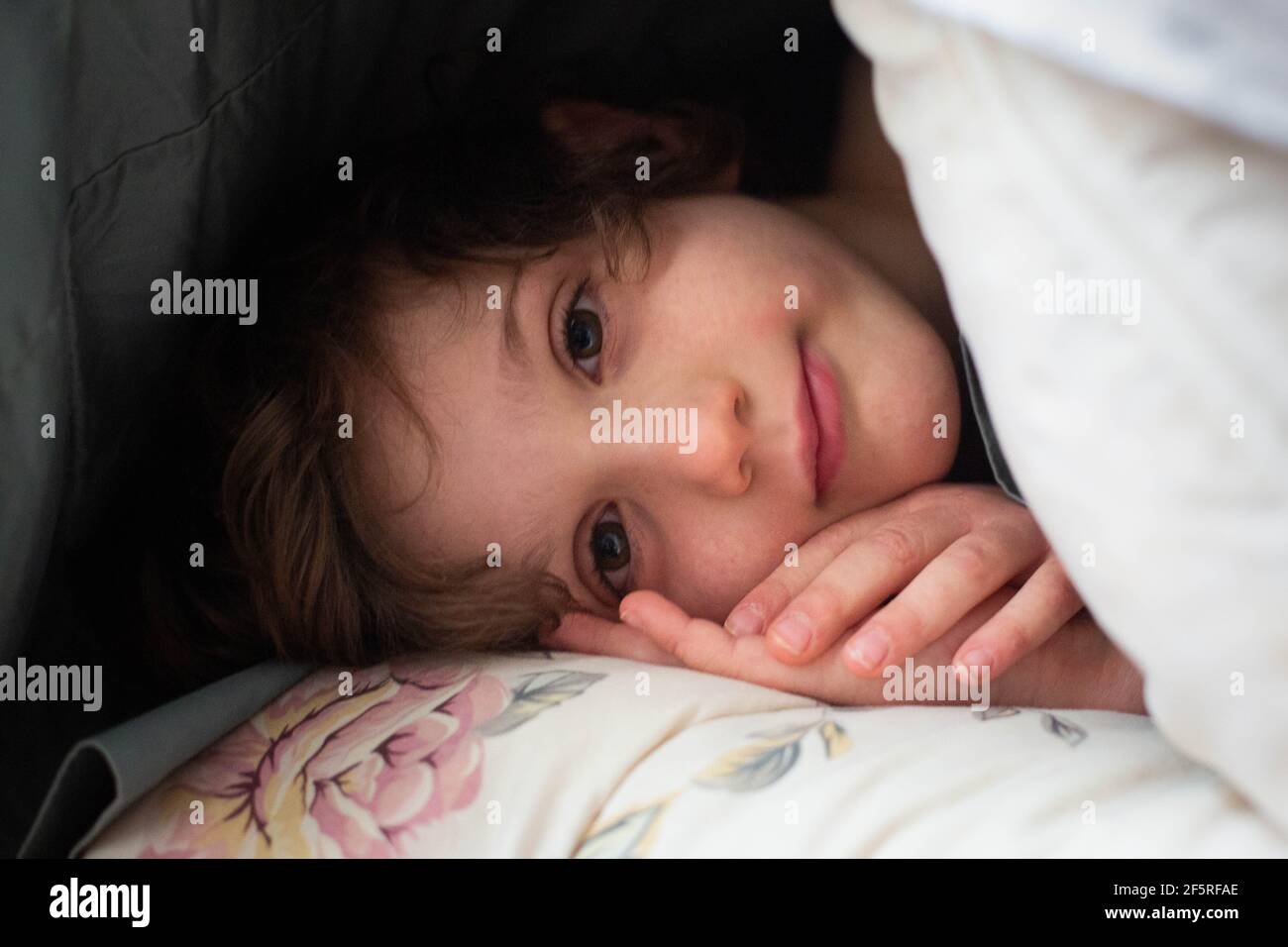 Boy laying down hi-res stock photography and images - Alamy