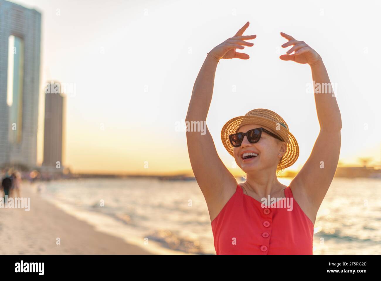 Woman dancing with blue dress hi-res stock photography and images - Alamy