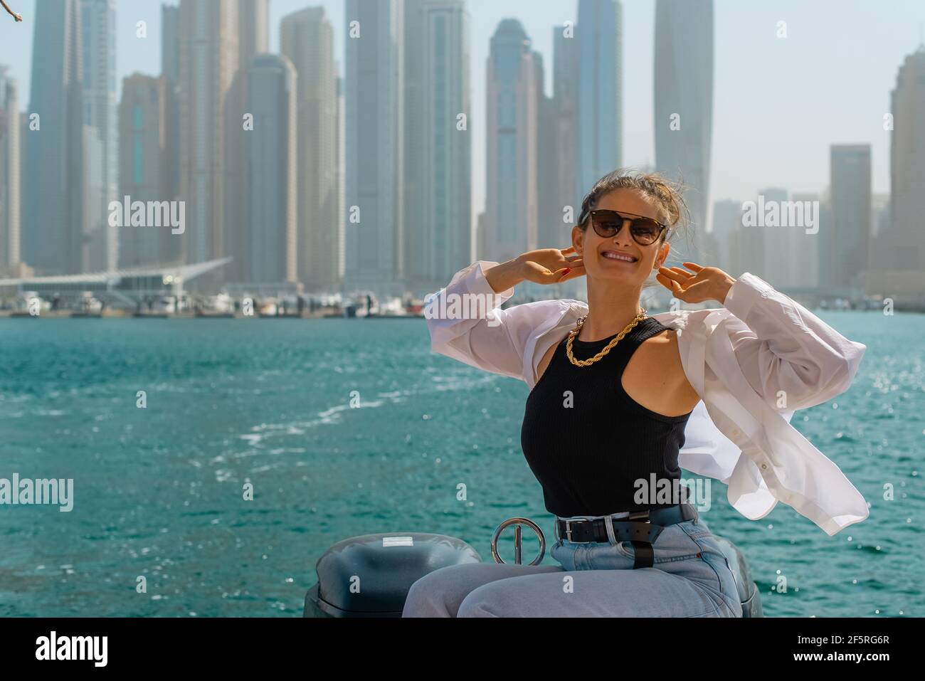 happy woman boating and enjoying life on vacation Stock Photo - Alamy