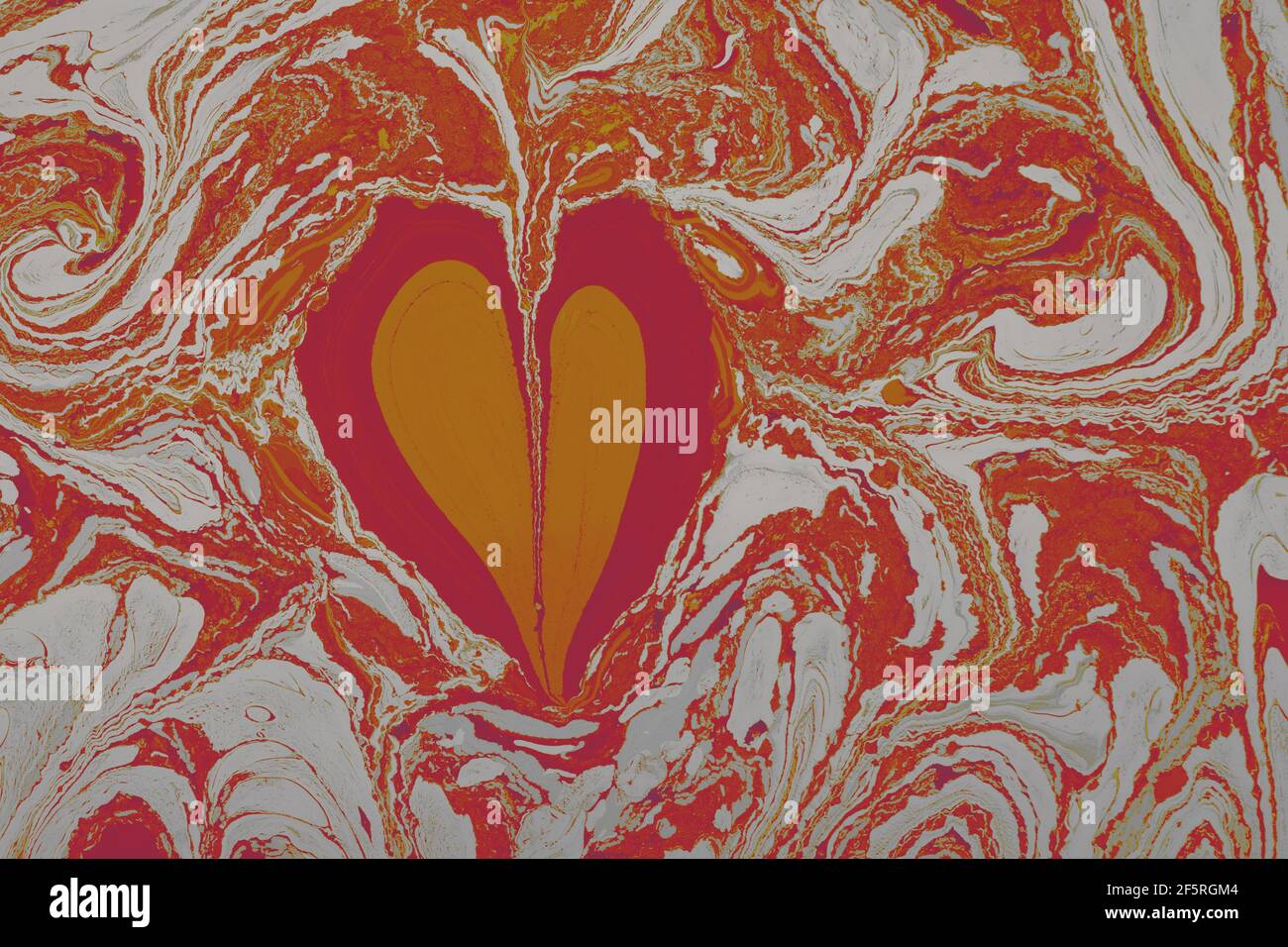 Paper marbling design texture with a heart-like shape on the iridescent ...