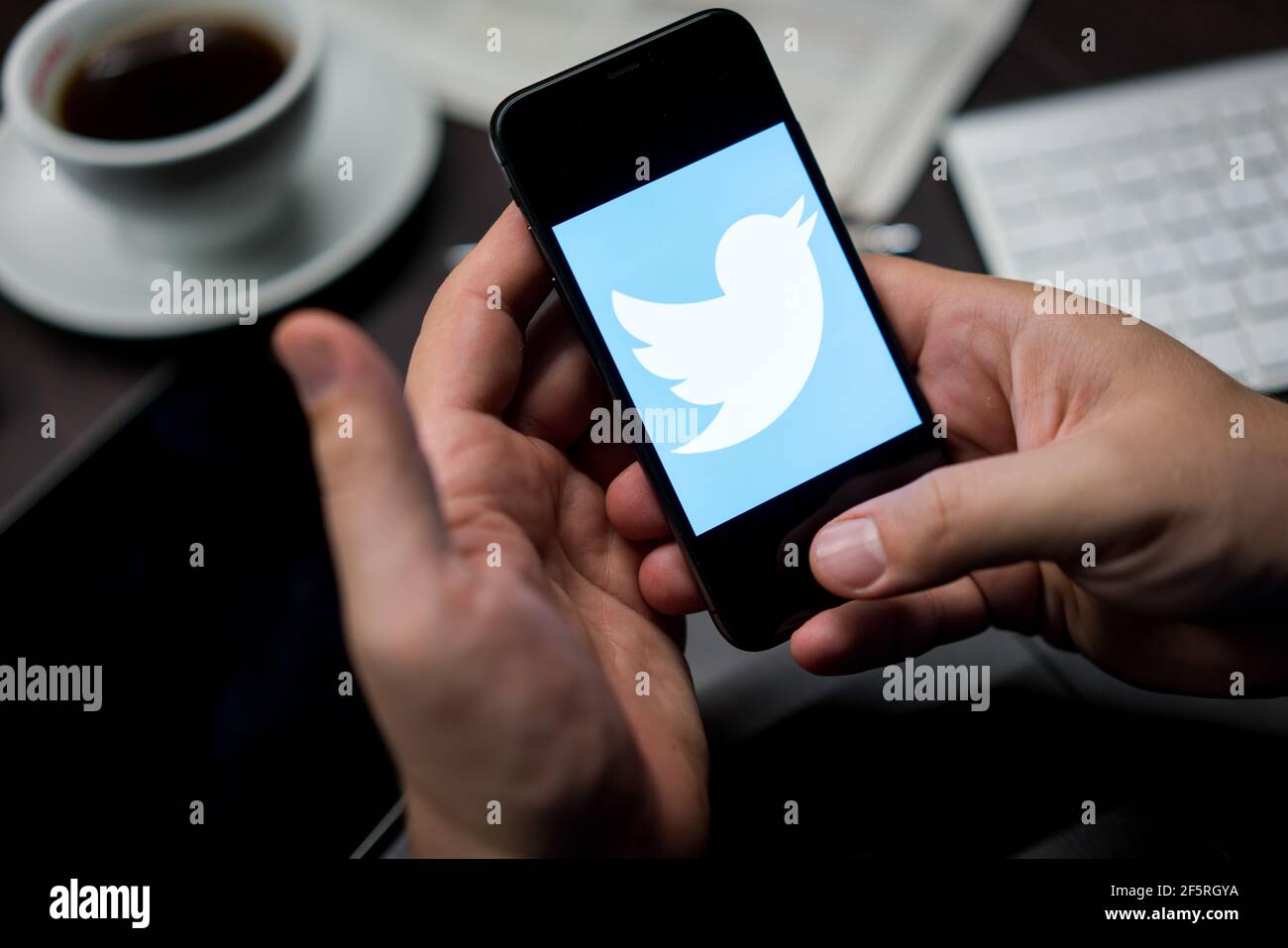 Twitter logo on screen office hi-res stock photography and images - Alamy