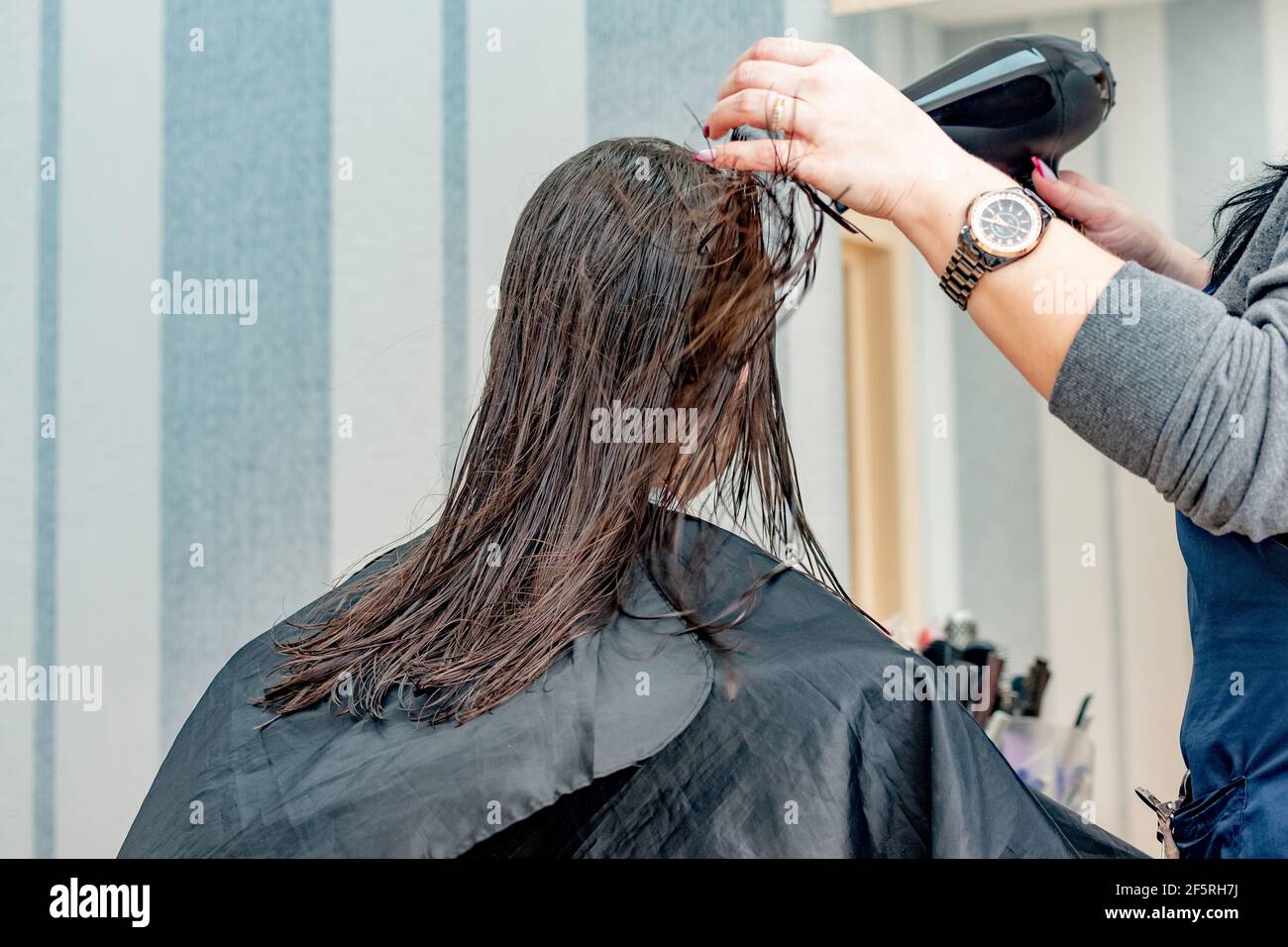 Happy Girl Getting her Hair Cut. A series of photos of a girl getting ...