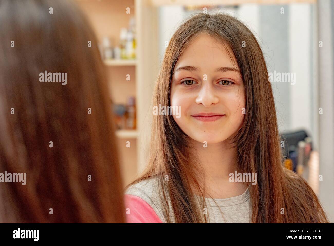 Happy Girl Getting her Hair Cut. A series of photos of a girl getting ...
