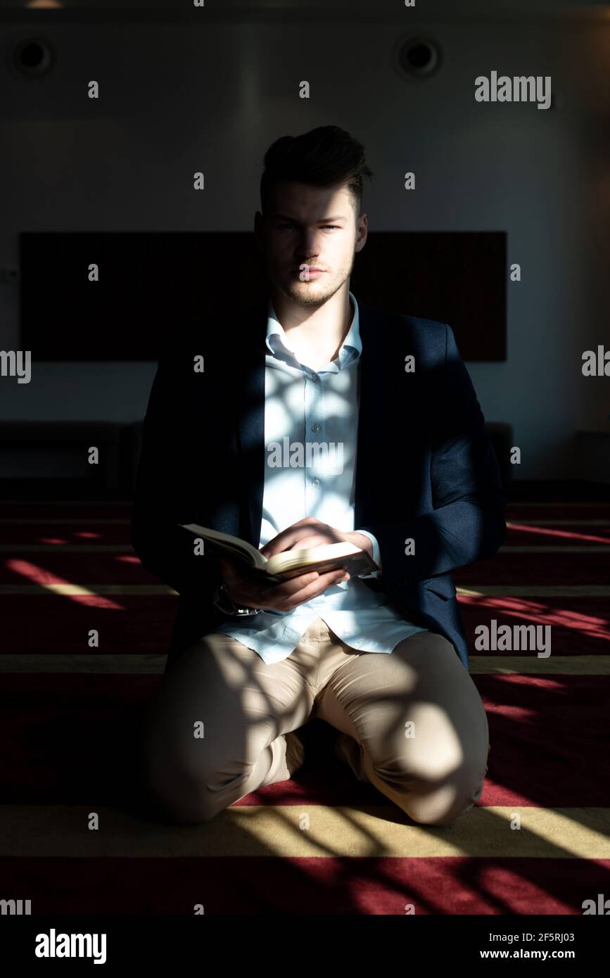 Attractive Man Making Traditional Prayer to God Allah in the Mosque ...