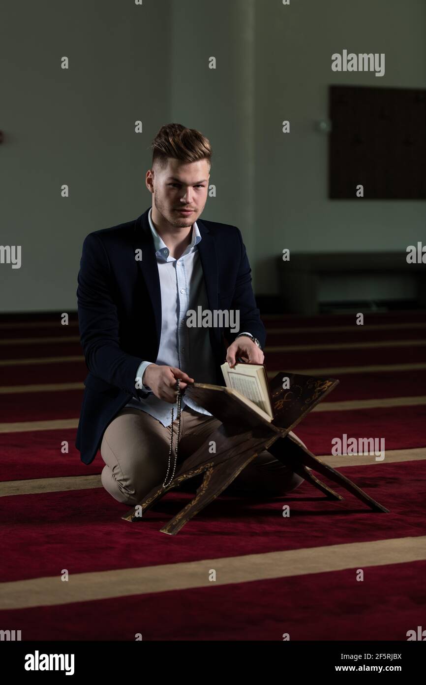 Attractive Man Making Traditional Prayer to God Allah in the Mosque ...
