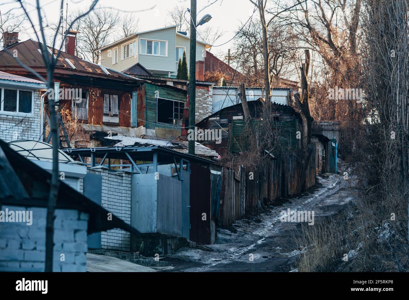 Old houses on low-rise street in old poverty part of Voronezh in Russia ...