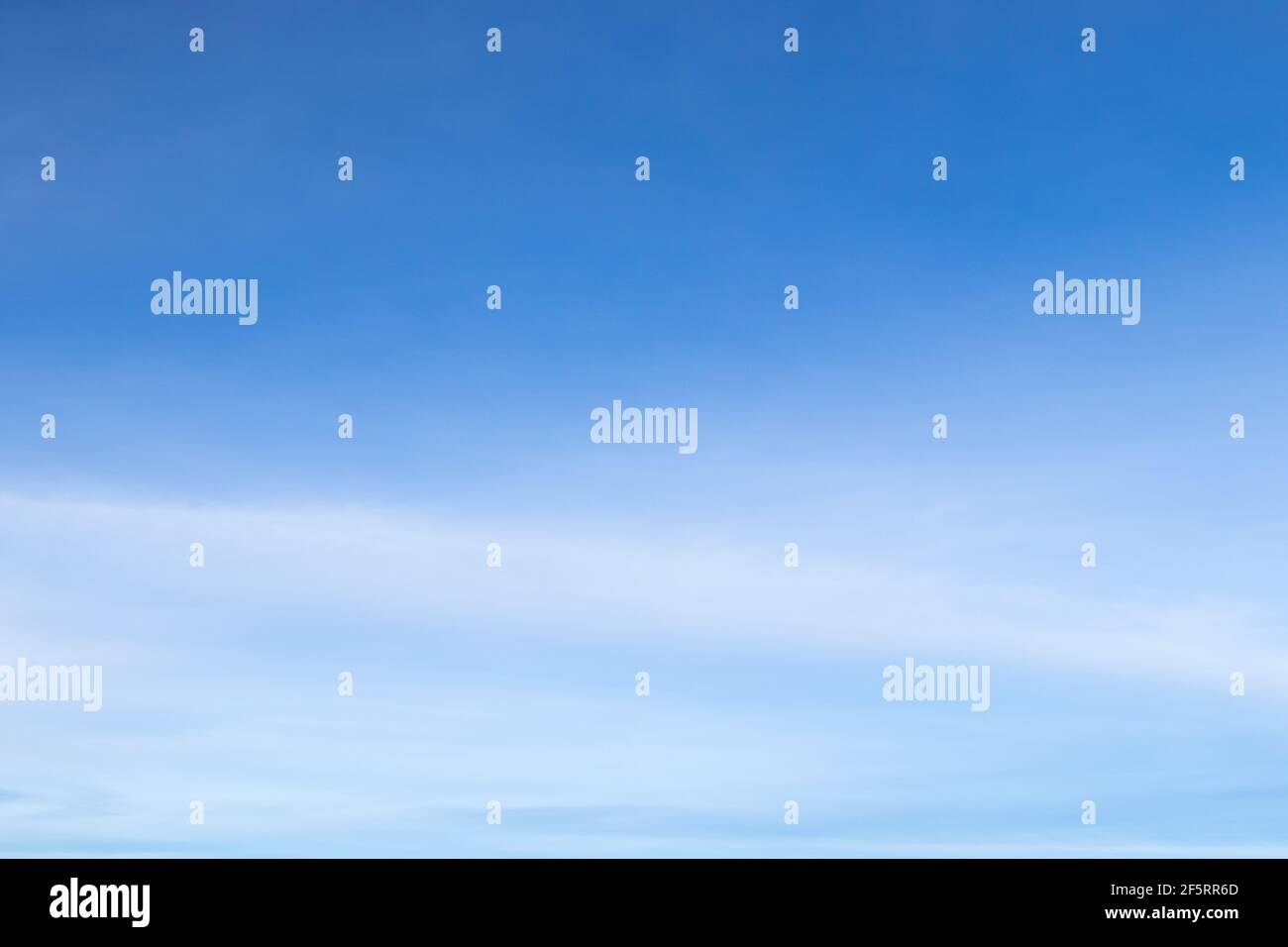 Clear blue sky with white cloud background Stock Photo - Alamy