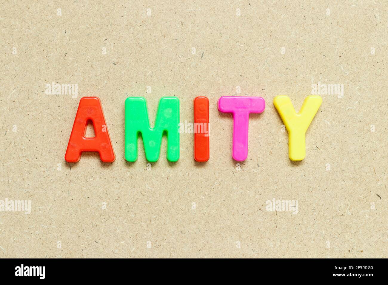Color alphabet letter with word amity on wood background Stock Photo ...