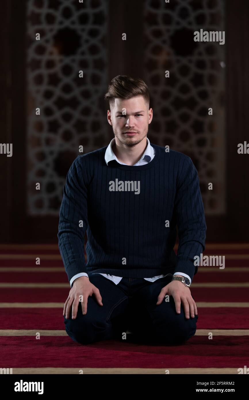 Attractive Man Making Traditional Prayer to God Allah in the Mosque ...