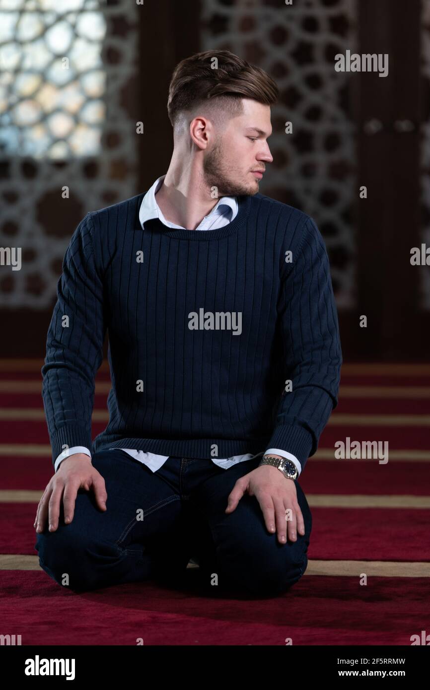 Attractive Man Making Traditional Prayer to God Allah in the Mosque ...