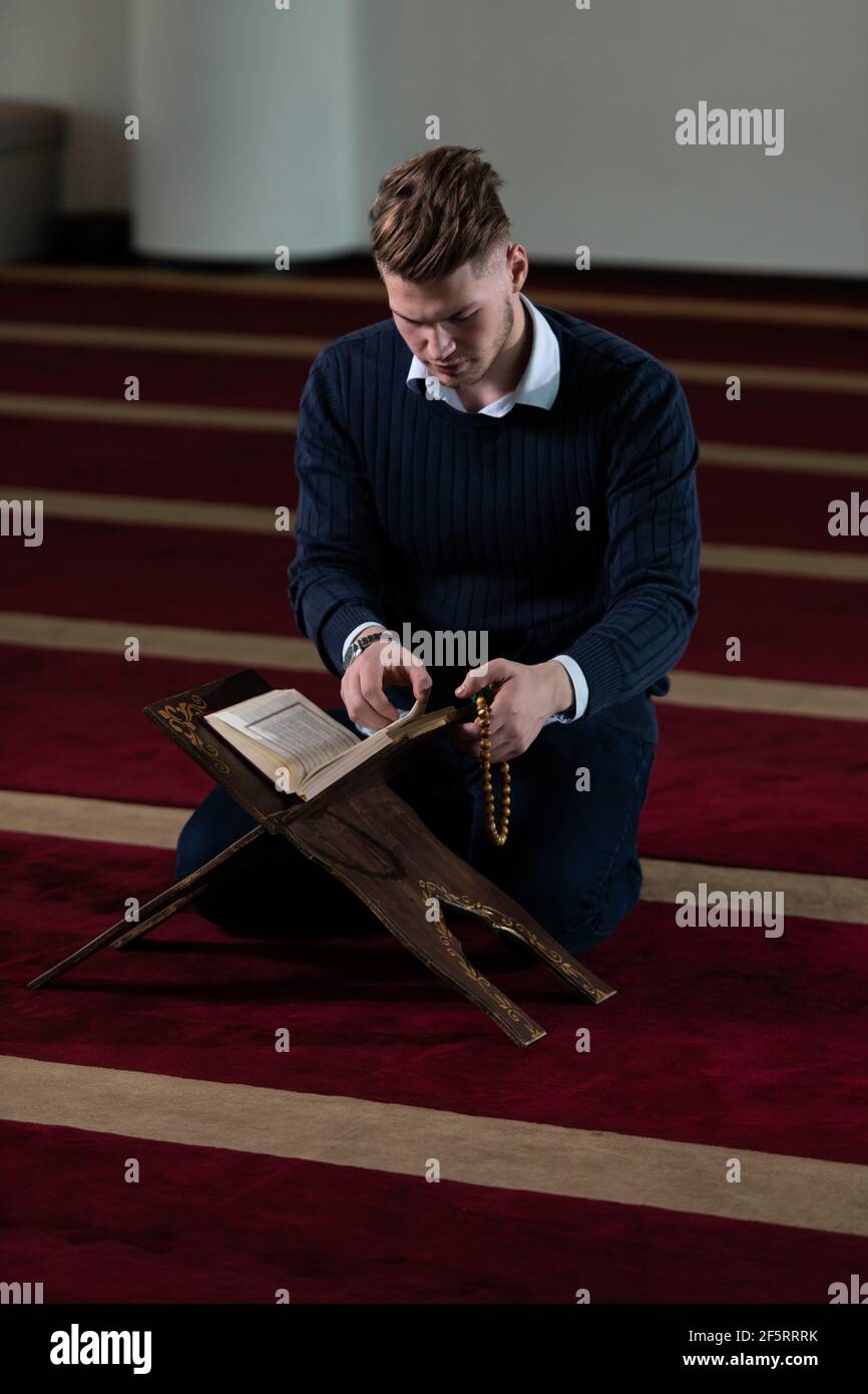 Attractive Man Making Traditional Prayer to God Allah in the Mosque ...