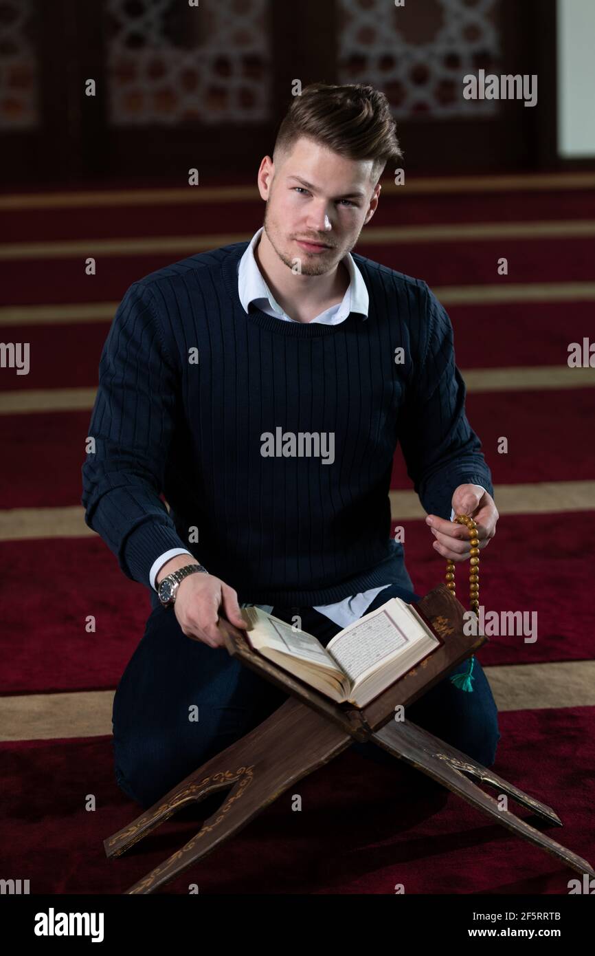 Attractive Man Making Traditional Prayer to God Allah in the Mosque ...