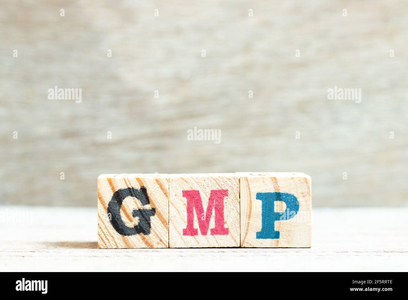 Alphabet letter block in word GMP (Abbreviation of good manufacturing ...