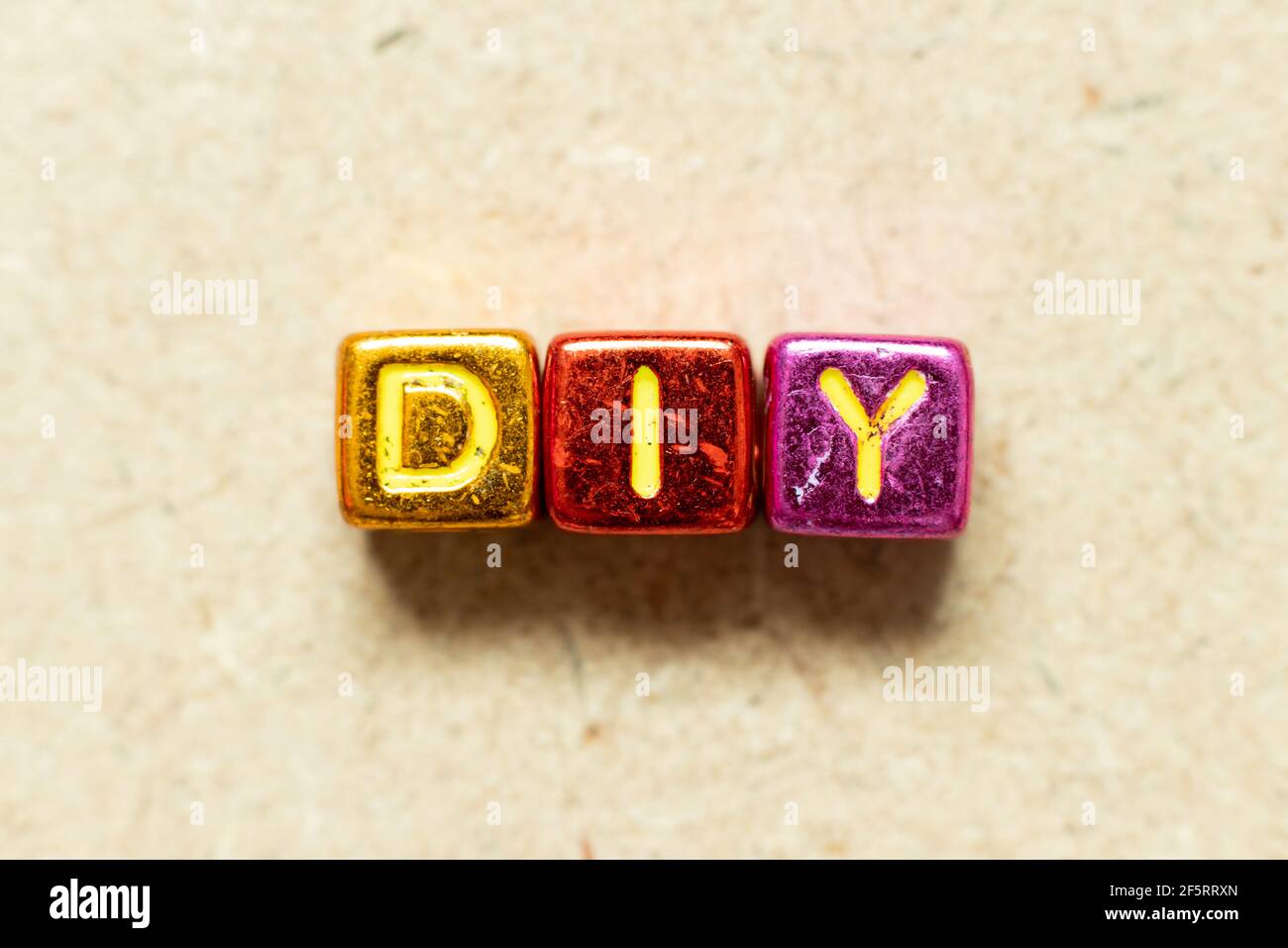 Metallic color alphabet letter block in word DIY (abbreviation of do it ...