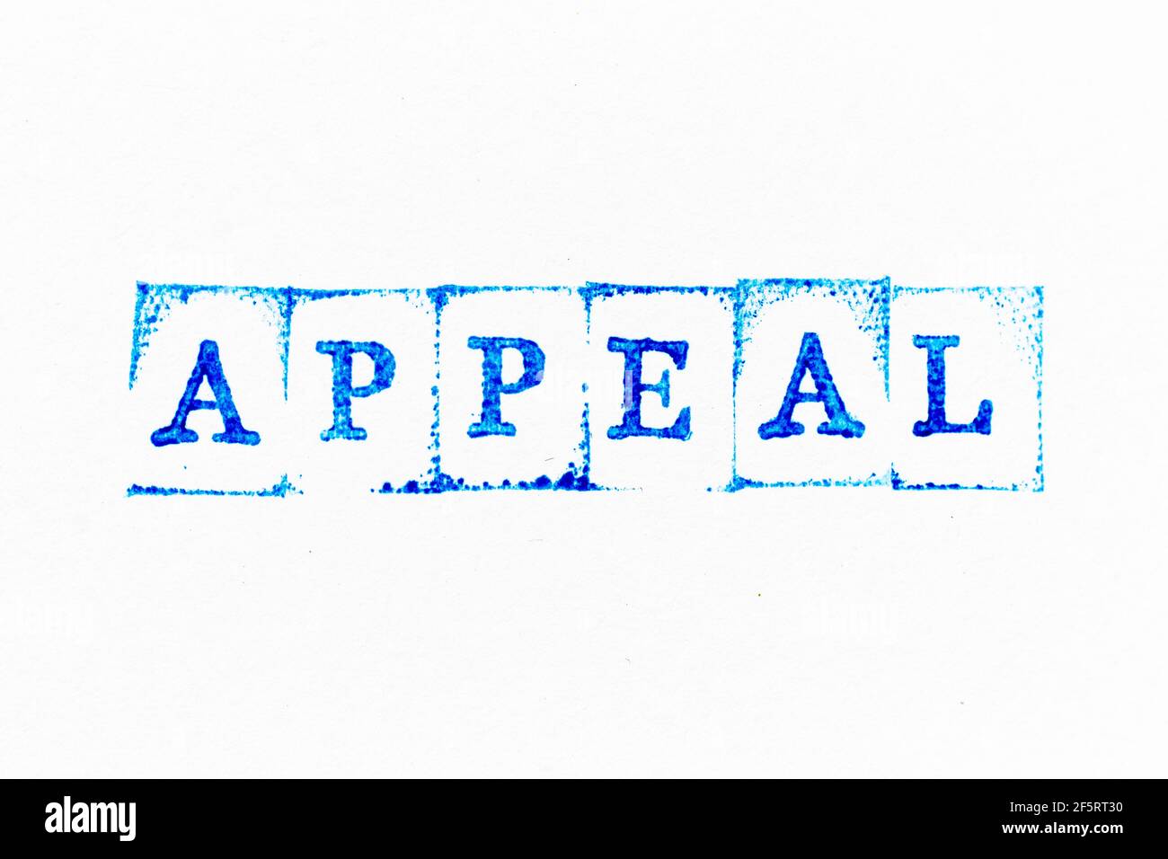 Blue color ink rubber stamp in word appeal on white paper background ...