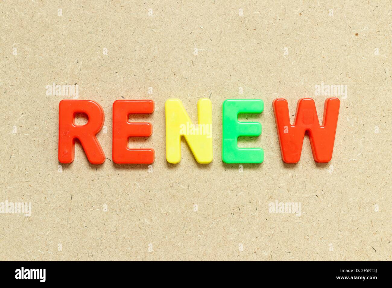 Color alphabet letter with word renew on wood background Stock Photo ...