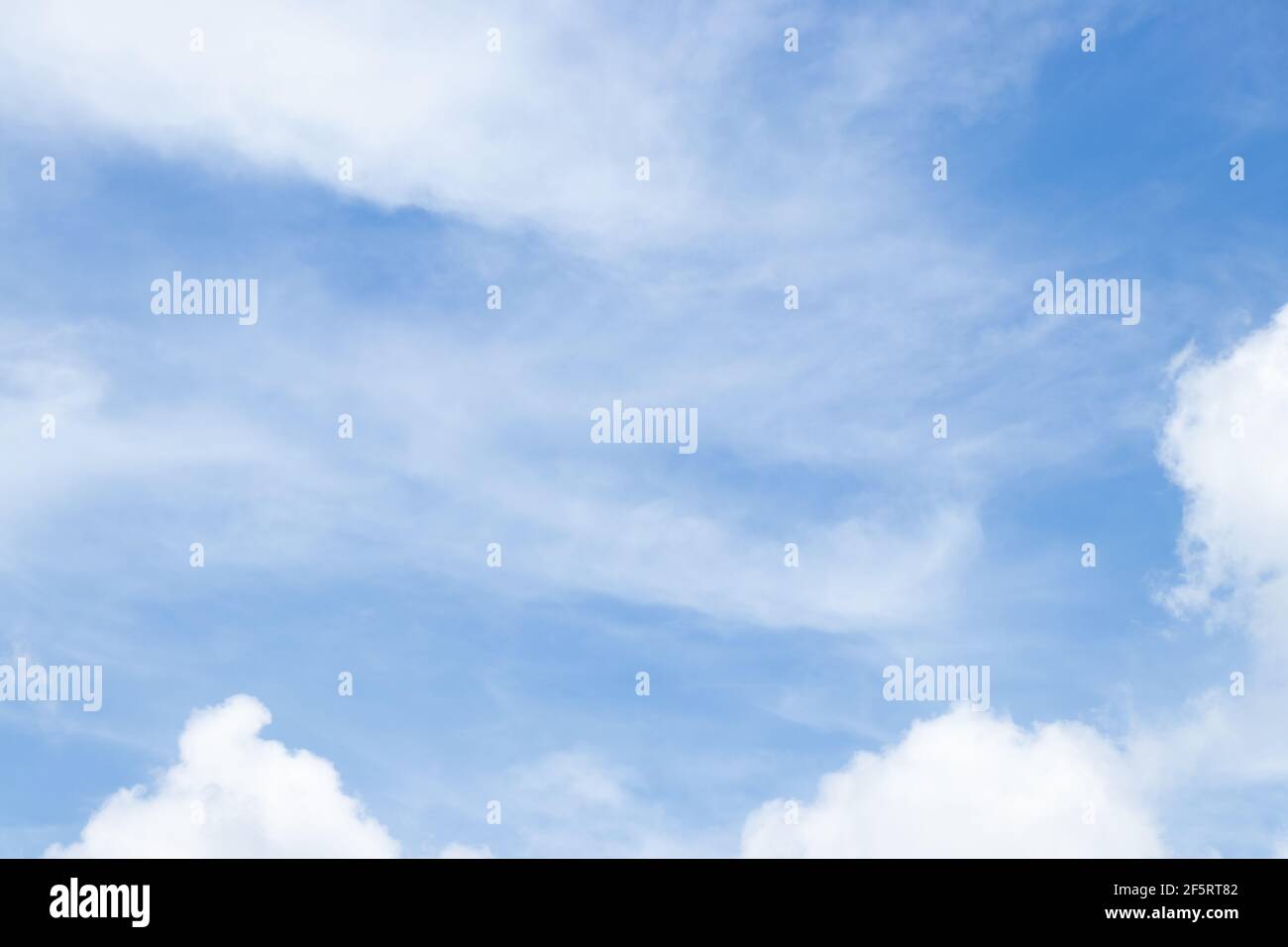 Clear blue color sky with white cloud background Stock Photo - Alamy