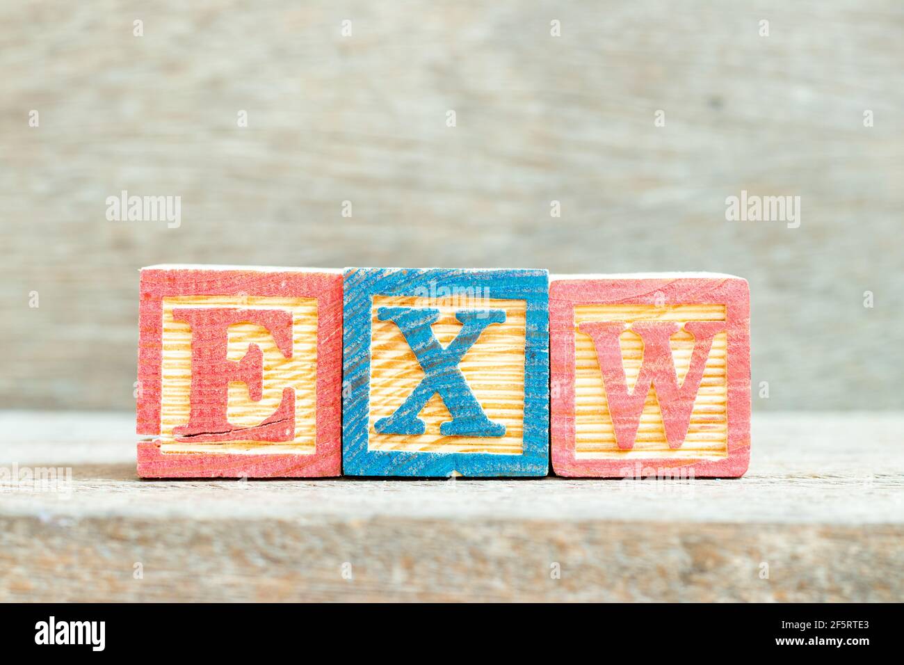 Color alphabet letter block in word EXW (abbreviation of Ex works) on ...