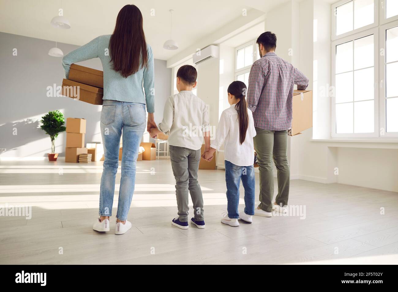 Children carrying empty boxes hi-res stock photography and images - Alamy