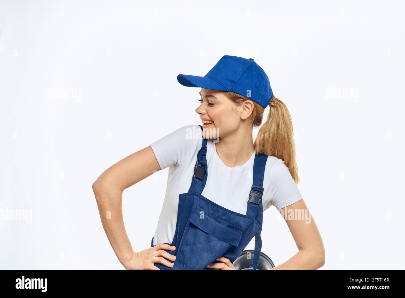 women in blue cap service professionals working Stock Photo - Alamy