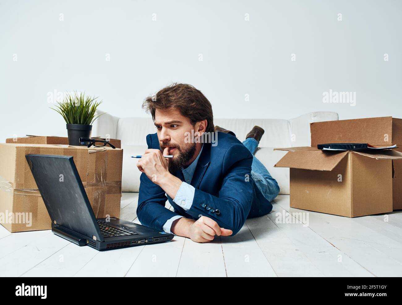 business man with boxes moving technology laptop Stock Photo - Alamy