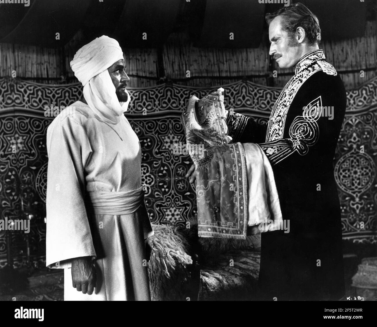 LAURENCE OLIVIER as The Mahdi and CHARLTON HESTON as General Charles ...