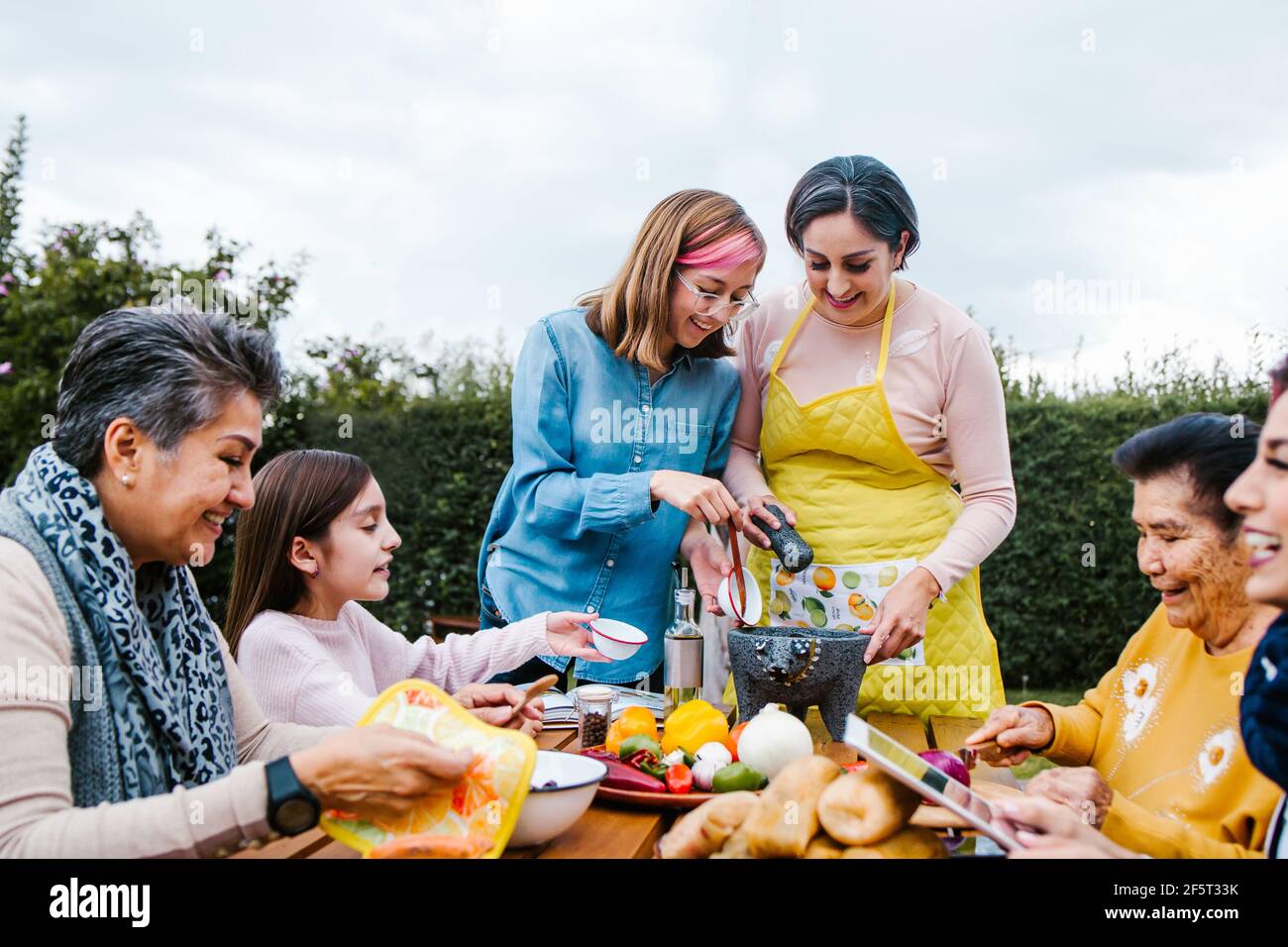 Family dinner table together mexico hi-res stock photography and images ...