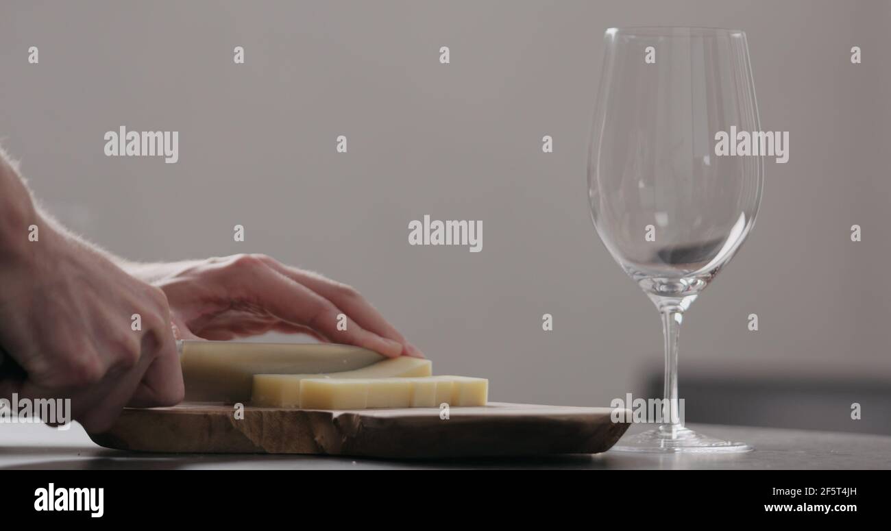 Man cutting vintage cheese on hi-res stock photography and images - Alamy