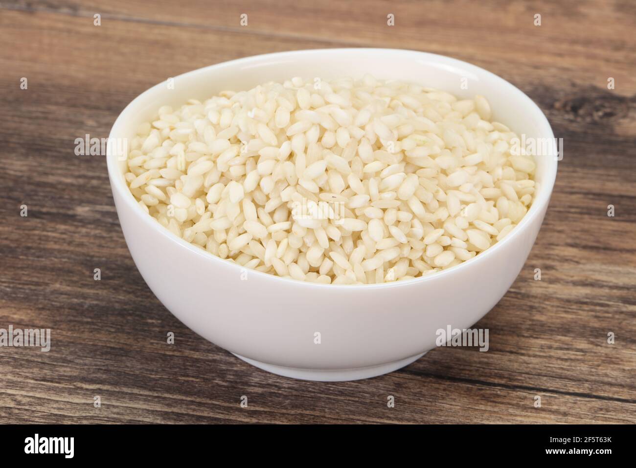 Raw Arborio rice for Italian risotto Stock Photo - Alamy