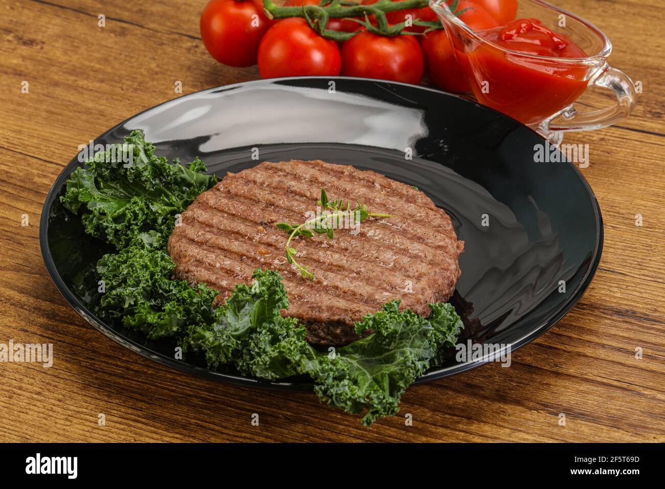 Grilled tasty beef cutlet for burger Stock Photo - Alamy