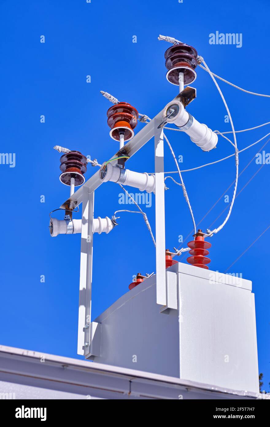 System for supplying and fastening high-voltage wires to the ...