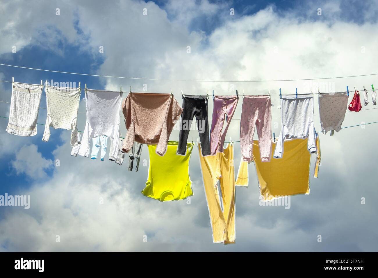 Clothes on wires hi-res stock photography and images - Alamy