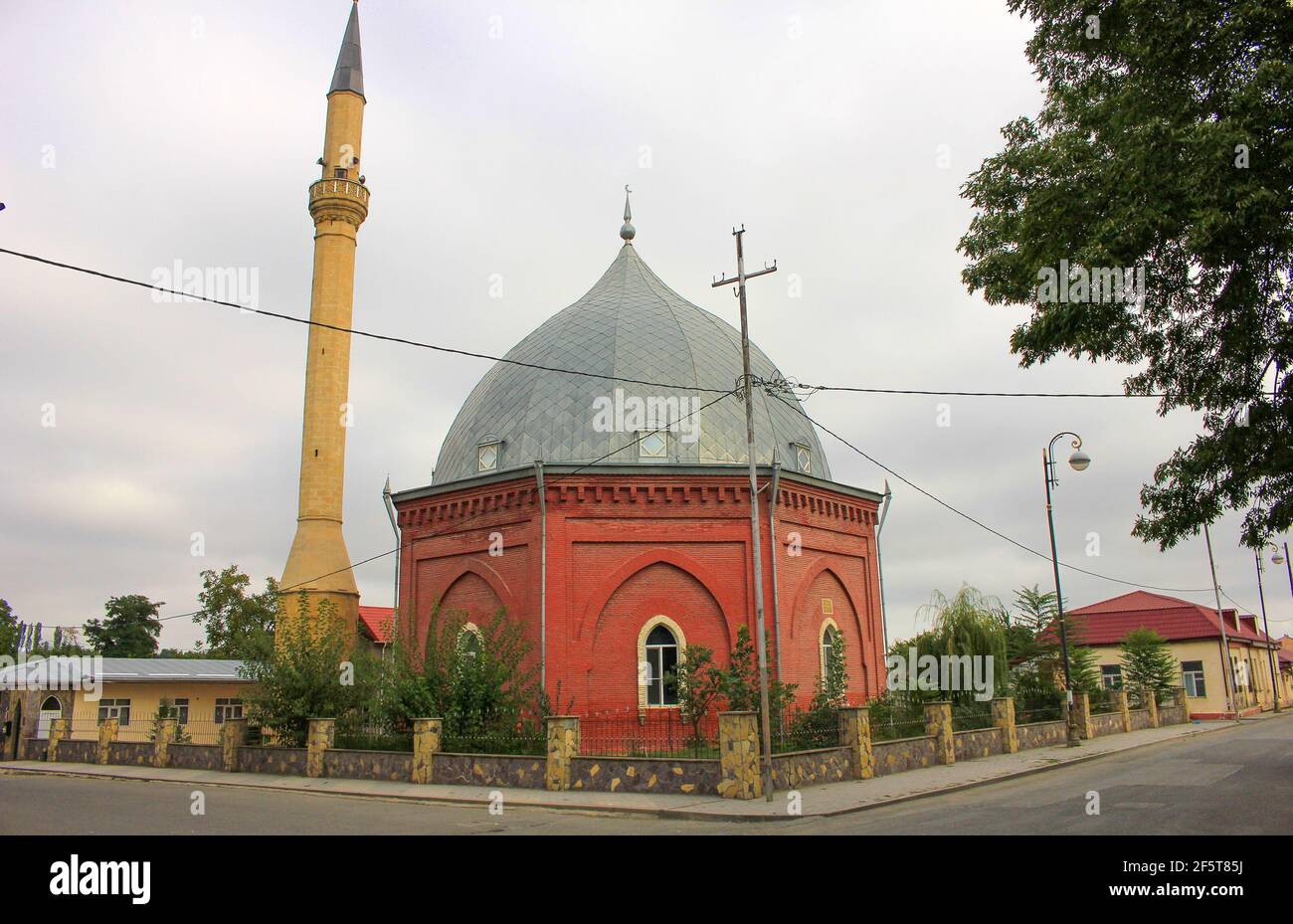 A beautiful red brick mosque. Cuba city. Azerbaijan Stock Photo - Alamy