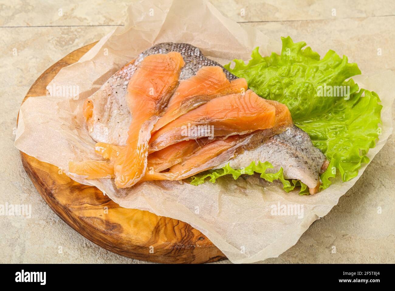 Sliced natural wild trout fillet over board Stock Photo - Alamy