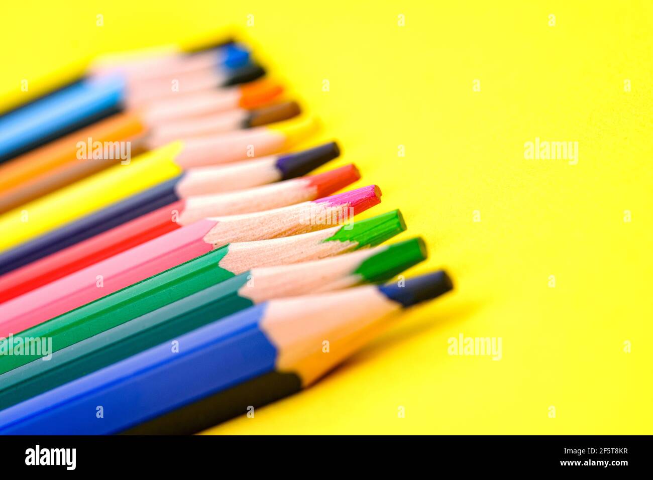 Background, blur, out of focus, bokeh. Colored pencils isolated on a ...