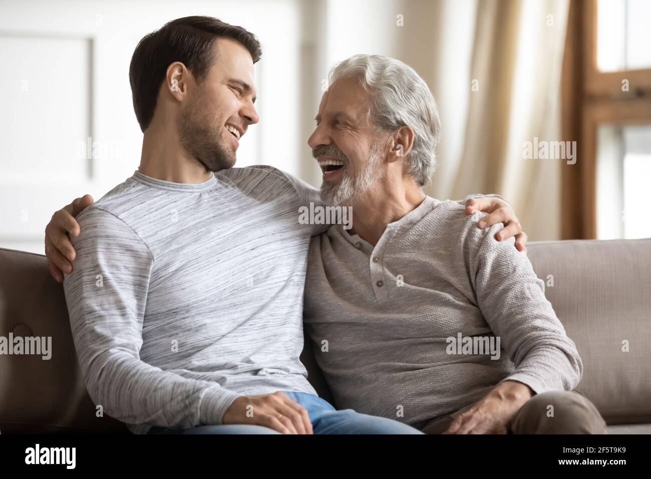 Old dad and adult son hi-res stock photography and images - Alamy