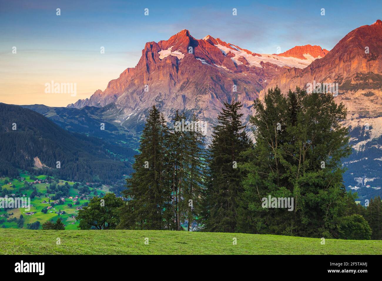 Beautiful alpine scenery and spectacular sunset with Wetterhorn peak in ...