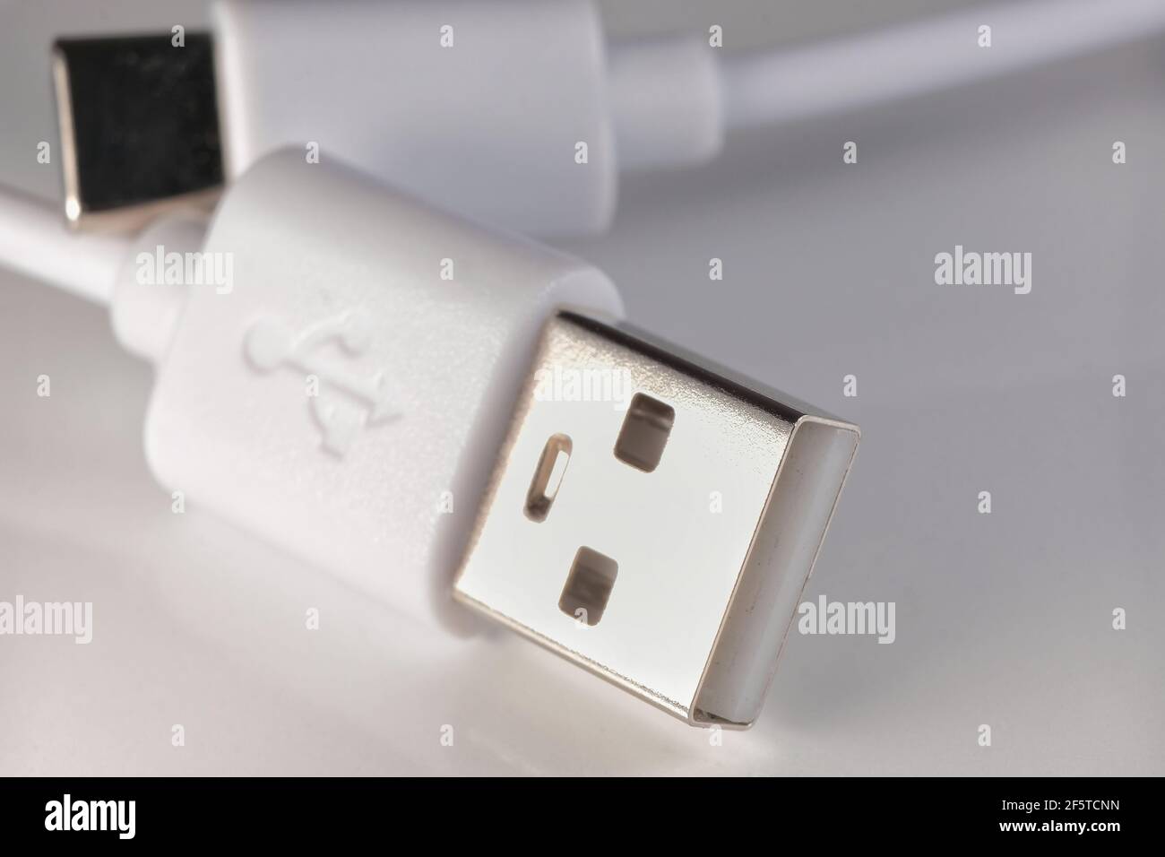 Extreme closeup of a white USB-C type cable on a white background Stock ...