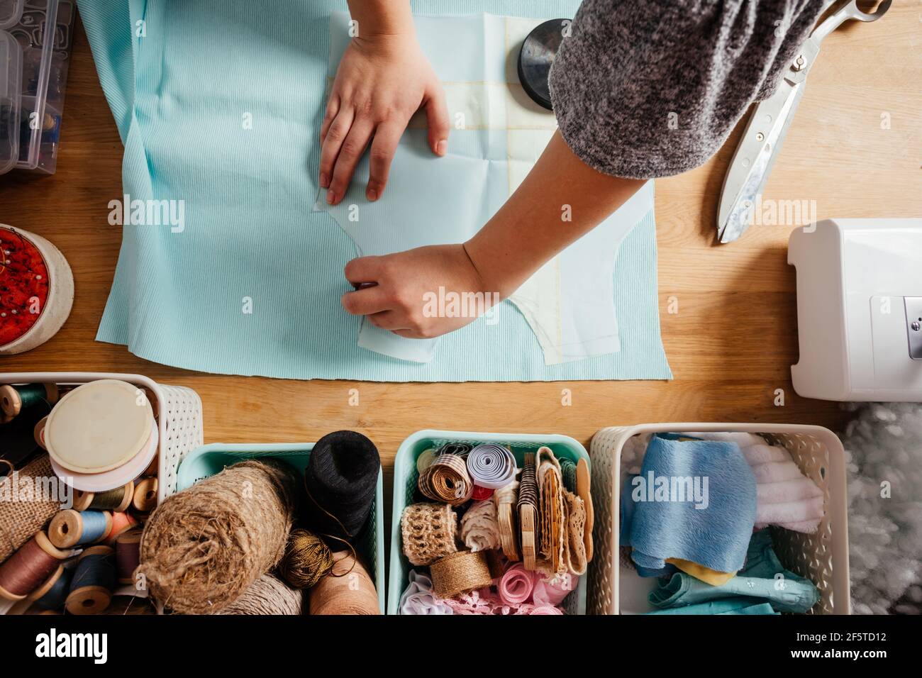 Designing and creating children clothes at home Stock Photo - Alamy