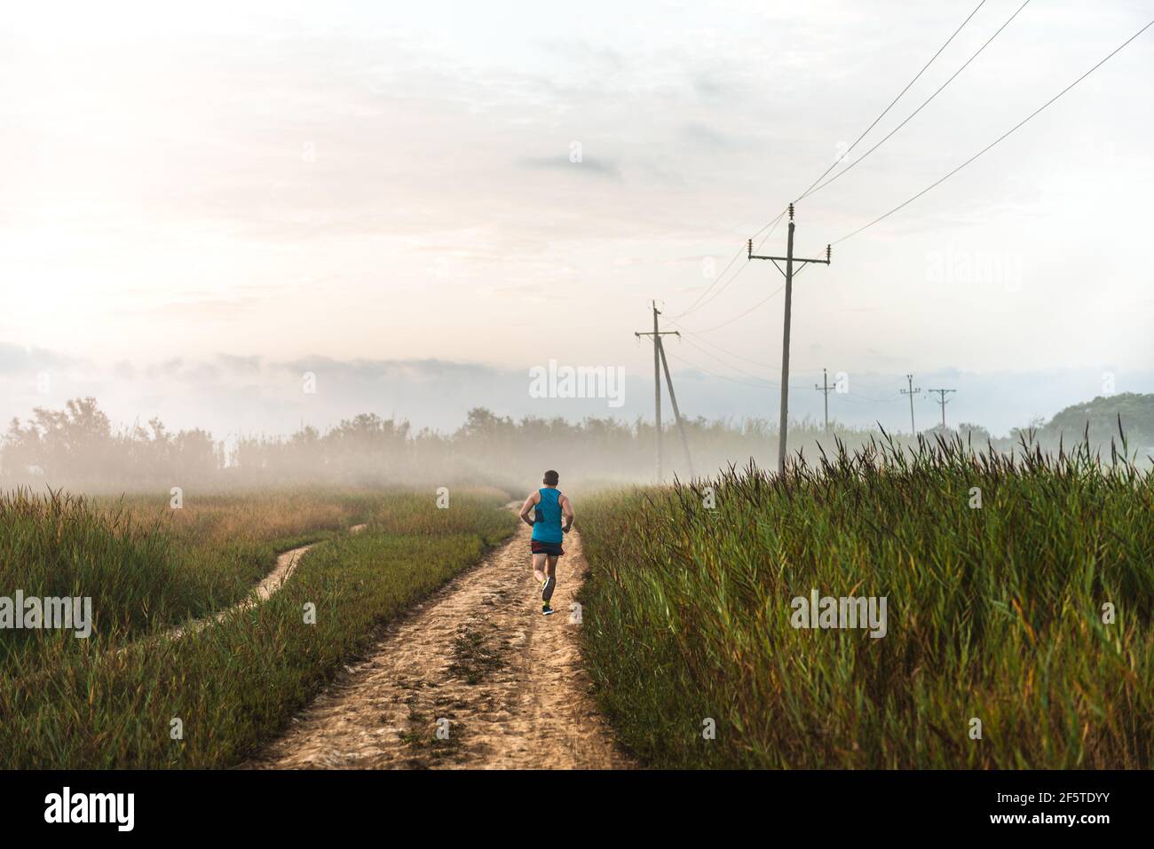 Male runner countryside hi-res stock photography and images - Alamy