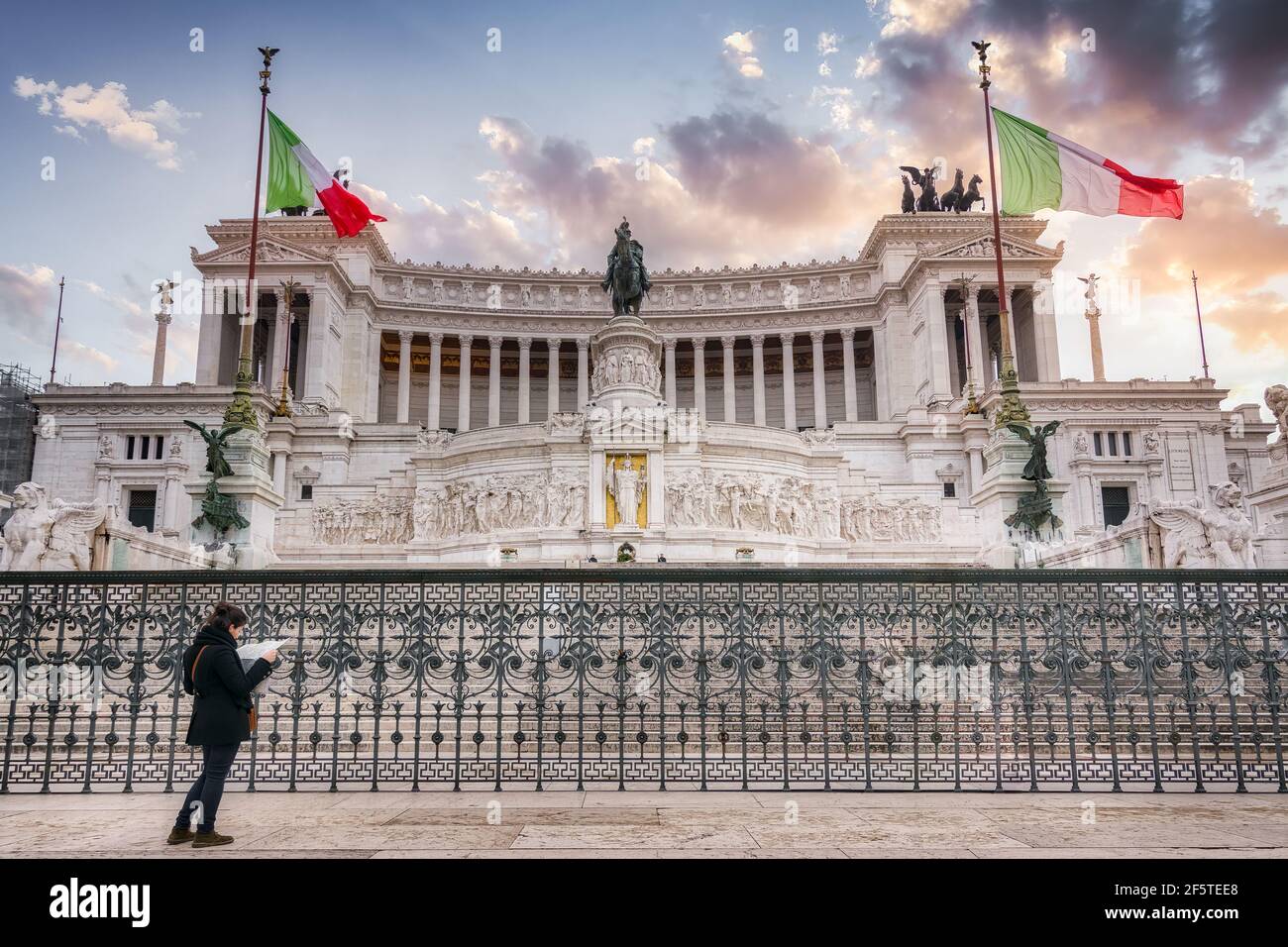 Low angle of female tourist standing with map near Altar of the ...