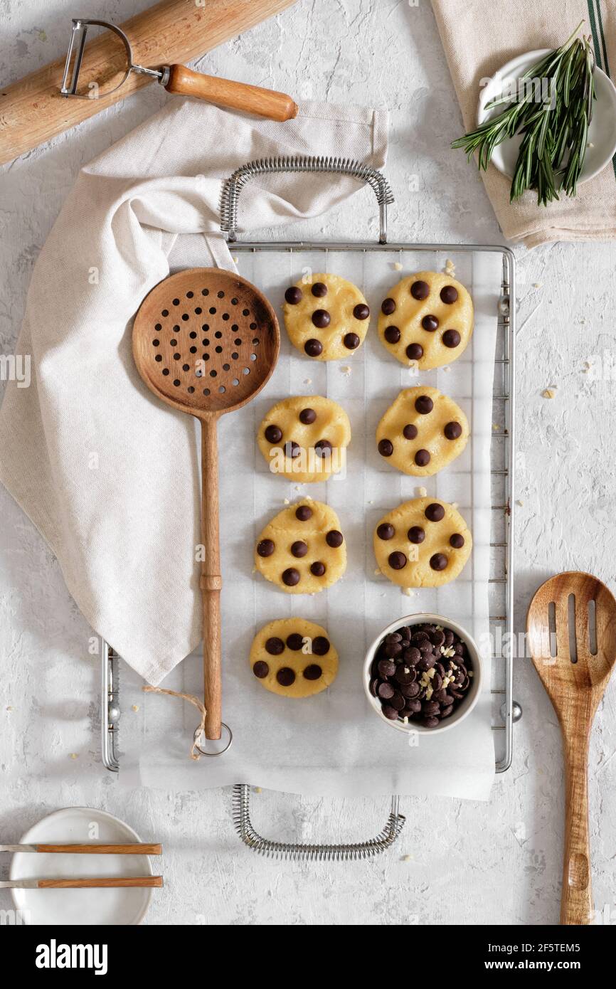 Top view of freshly baked sweet cookies with chocolate chips on metal ...