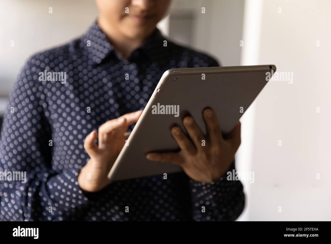 Close up Indian woman holding using tablet, browsing apps Stock Photo ...